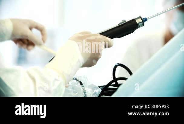 Operating process in hospital. Doctor performing operation with surgery ...