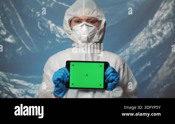Medical lab doctor hold modern laptop with green screen. Health versus ...