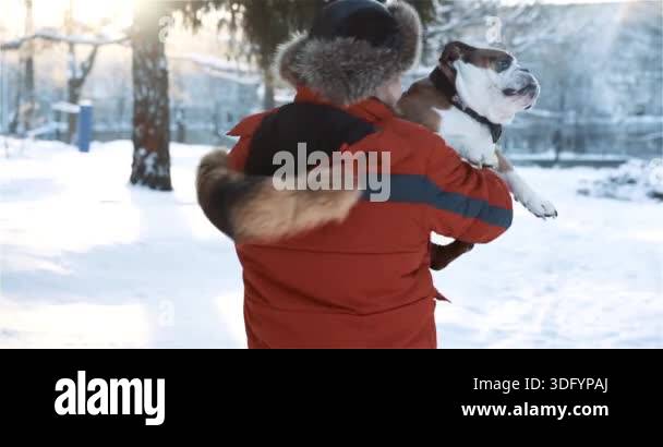 Close up of happy bearded man hugging and gently kissing his cute ...