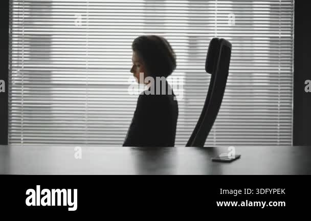 Silhouette of tired business lady in ofiice behind the desk. Woman ...