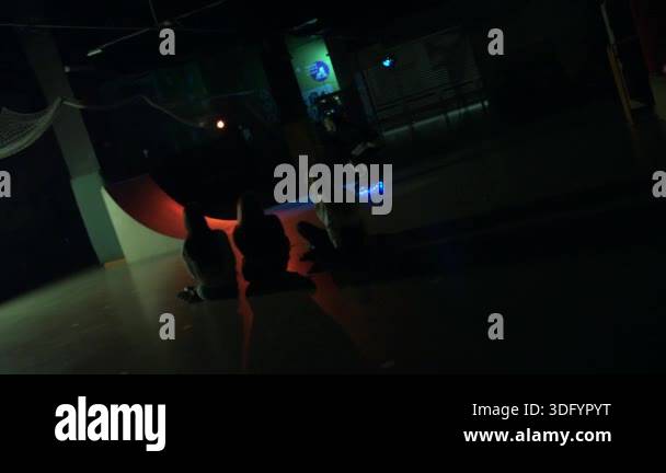 Young guy doing stunt on ramp roller-skating. Millennial showing off ...