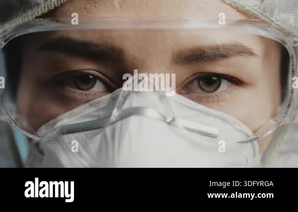 Eyes of female healthcare professional doctor in a hospital operating ...