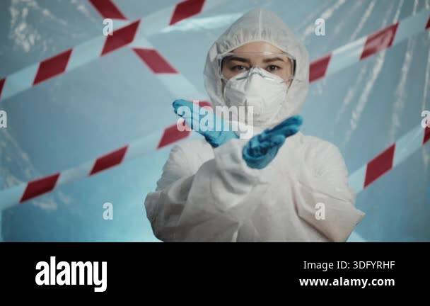 Medical lab female doctor in mask with protective infection gloves and ...
