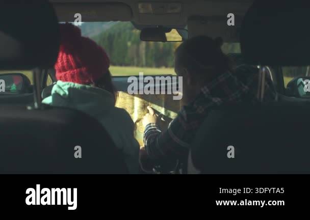 Travelling by car after pandemic. Cute hipster couple of young ...