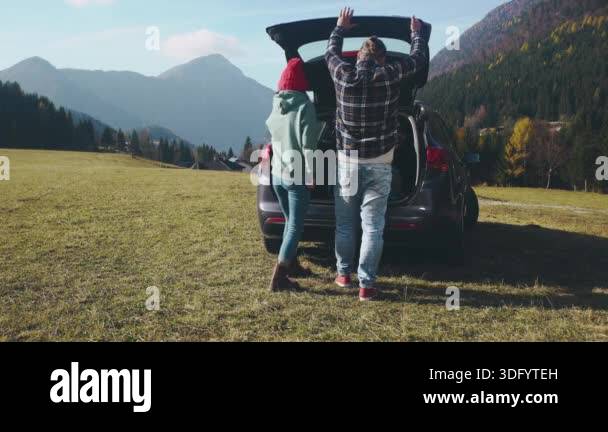 Cute hipster couple of young millennials on their roadtrip after ...