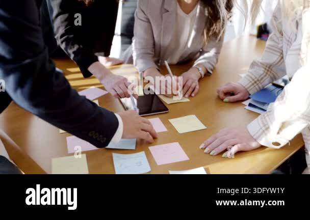 Office scene of group discussion of upcoming project. Young managers ...