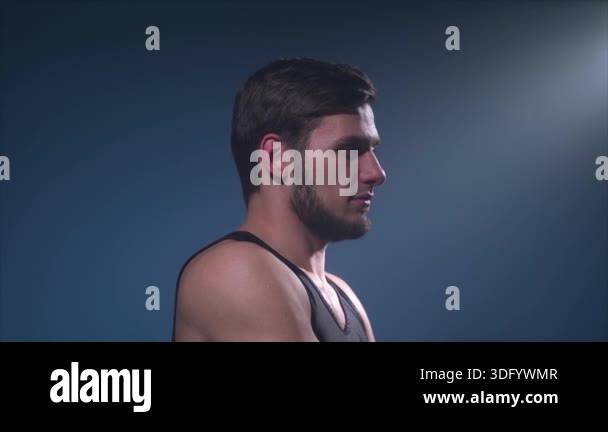 Sporty muscular white man portrait isolated. Pretty serious sportsman ...