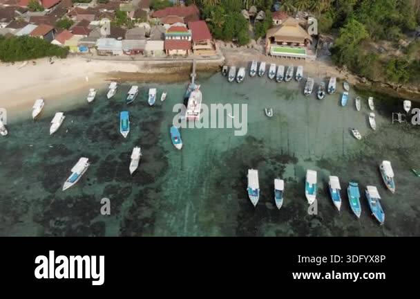 Bali, Indonesia - March 30, 2018: Axel Aerial view of boat pier in ...
