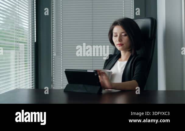 Concept of freelance. Business woman sitting behind desk in office ...