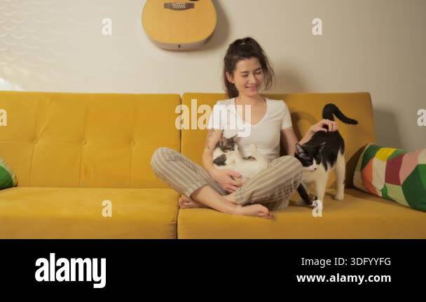 Strong and independent child free female spend her free time with pets ...