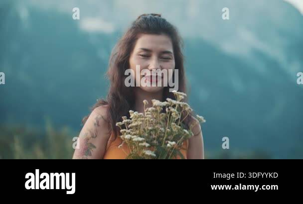 Girl tourist standing on cliff at seaside. The mood of cinematography ...