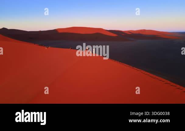 Aerial view of dazzling colourful dune in african desert. Magnificent ...