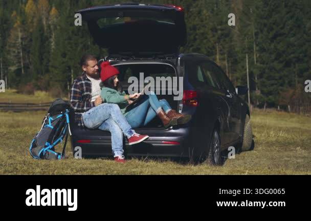 Cute hipster couple of young millennials on their roadtrip after long ...