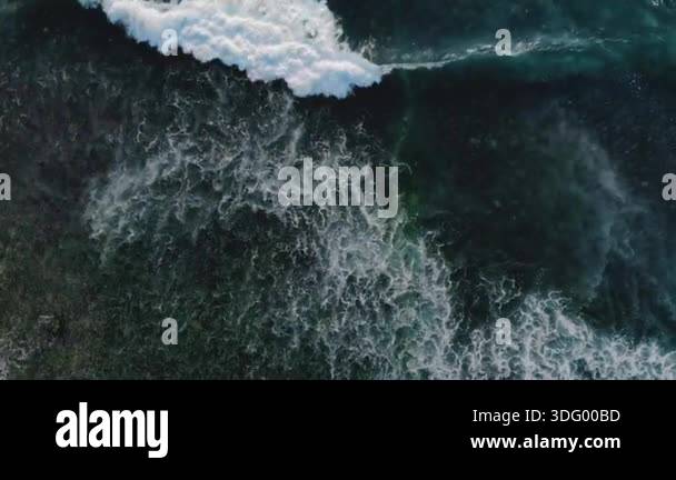 Top down view of fantastic tropical sea tide on coastline. Drone shot ...