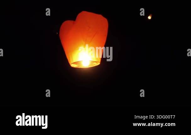 The Chinese lantern flies up in the sky Stock Video Footage - Alamy
