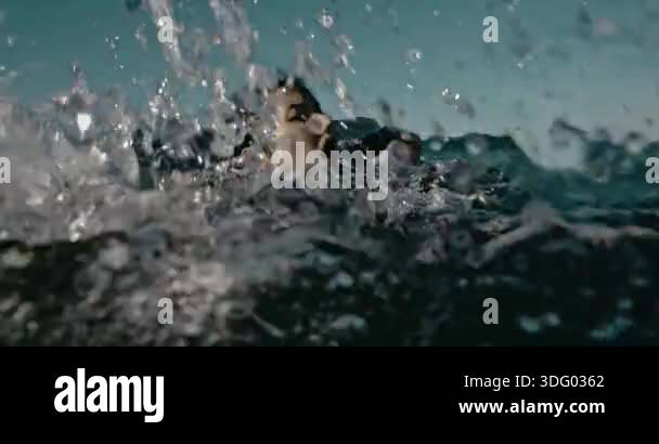 Woman choking in strong waves in storm, filmed on cinematic camera ...