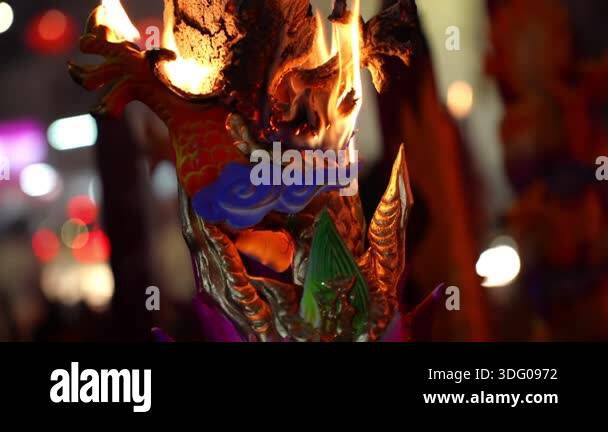 Dragon incense stick is burnt in night view Stock Video Footage - Alamy