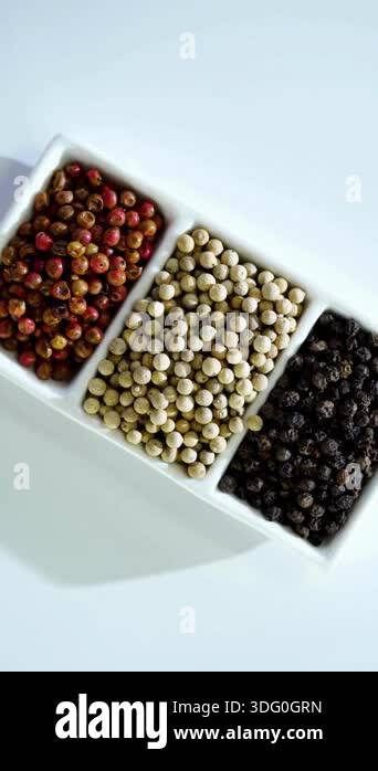 Top down view of white rectangular divided dish containing pink white ...