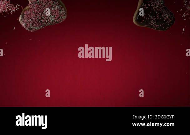 Heart shaped donuts with chocolate glaze and pink sprinkles fall ...