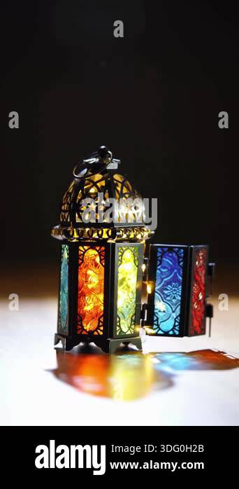 Open door view of colorful stained glass arabic lantern casting vibrant ...