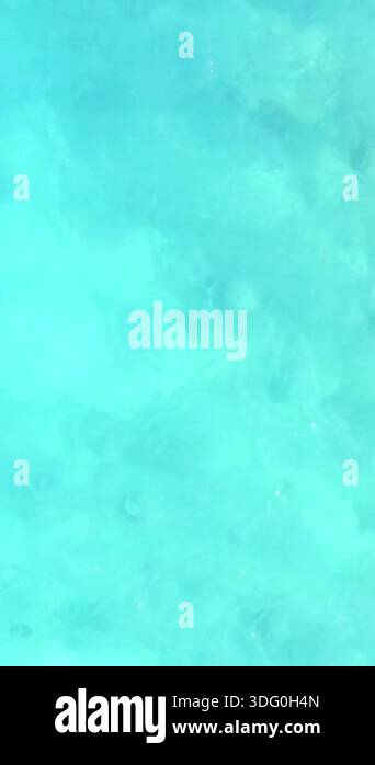 Top down aerial view of crystal clear turquoise ocean water surface ...