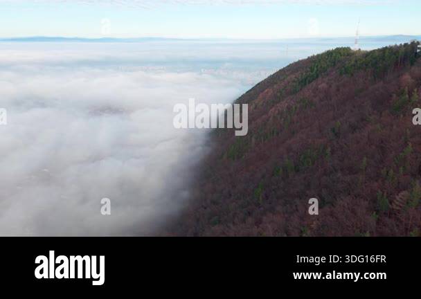 Aerial drone footage of the Brasov sign on Tampa Mountain, part of the ...