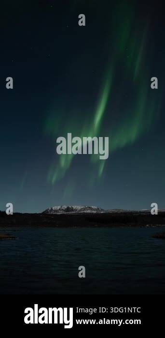 Aurora borealis moonlight landscape Thingvellir lake Iceland Stock ...