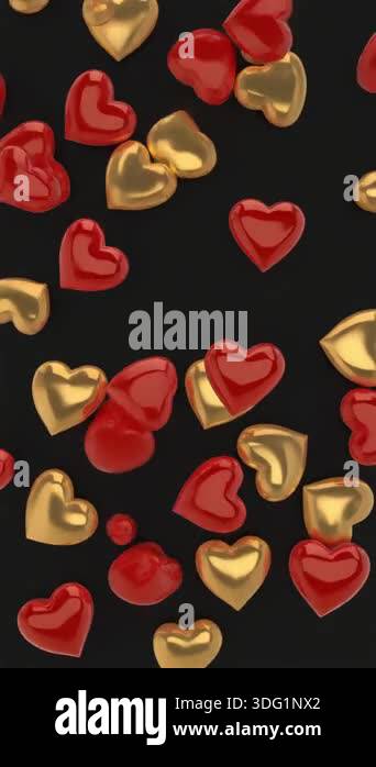 Hearts float and move on a black background with red and golden colors ...