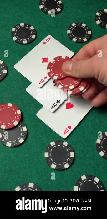 The video captures a hand during which red poker chips are placed on a ...