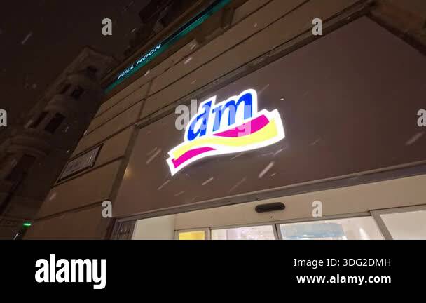 Budapest, Hungary - Jan 6, 2026: A glowing "dm" drugstore logo on a ...