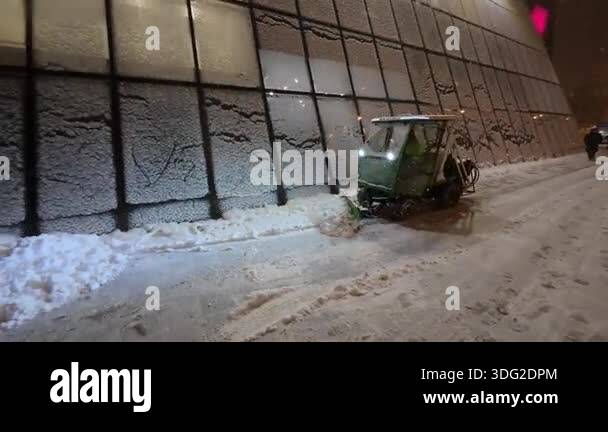 Budapest, Hungary - Jan 6, 2026: A municipal utility vehicle clears ...