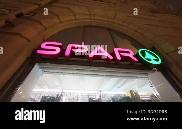 Budapest, Hungary - Jan 6, 2026: Exterior view of a glowing "Spar ...