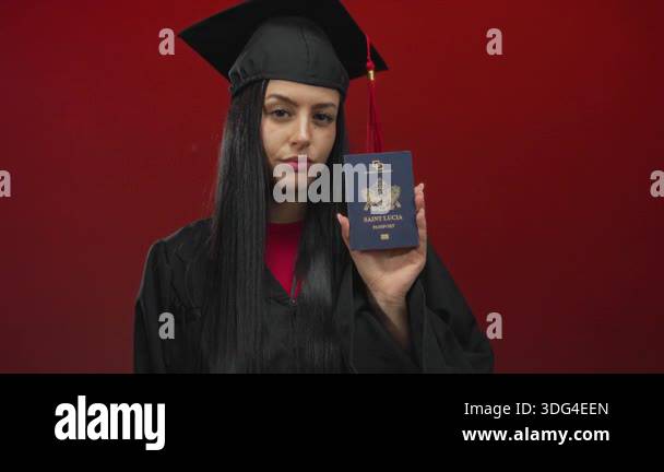 Young hispanic woman in graduation uniform holding saint lucia passport ...