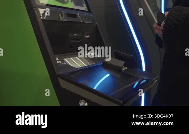 Woman using ATM displaying options and card slot, closeup Stock Video ...