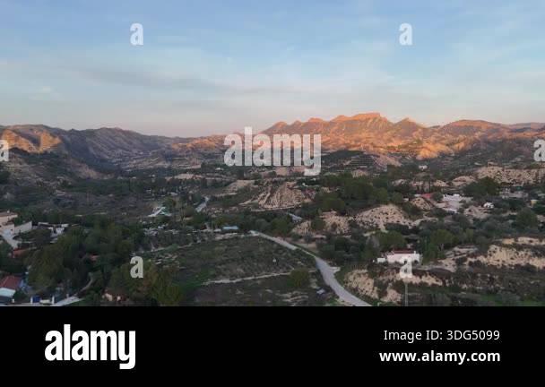 Aerial drone view of Sierra de Carrascoy mountain range at golden hour ...