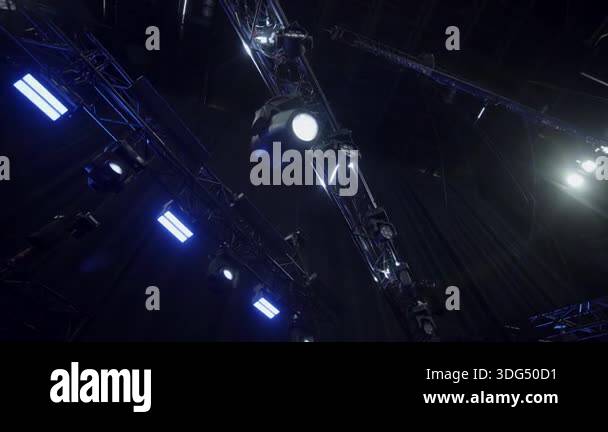 Powerful lighting equipment system on frame over stage low angle shot ...