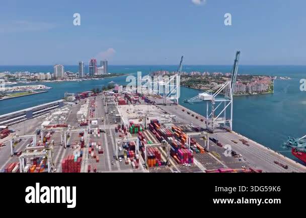 Miami, Florida, USA - May 22, 2025: Export and import. Cargo loading ...