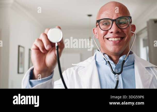 A friendly medical doctor, bald and wearing glasses, smiles warmly ...