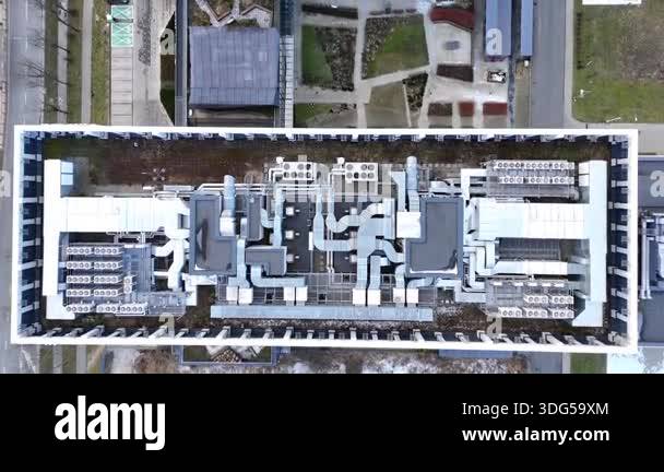 Aerial view of industrial rooftop showcasing extensive HVAC system with ...