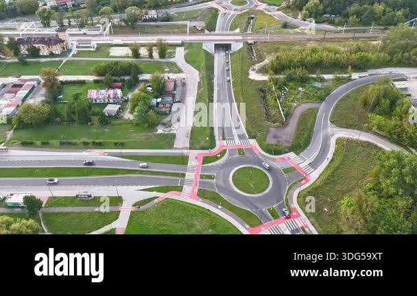 Aerial view of traffic flow at a roundabout intersection showing ...