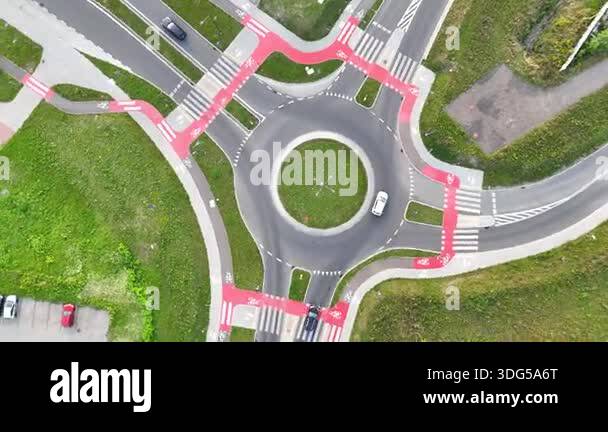 Aerial view of traffic flow at a roundabout intersection showcasing ...