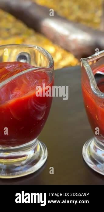 Various hot sauces are on the table in a restaurant, food, chili ...
