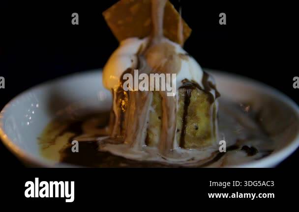 Chocolate pouring onto ice cream. High quality 4k footage Stock Video ...