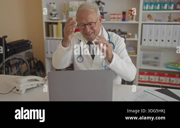 Senior doctor man in uniform talking on phone in clinic room with ...