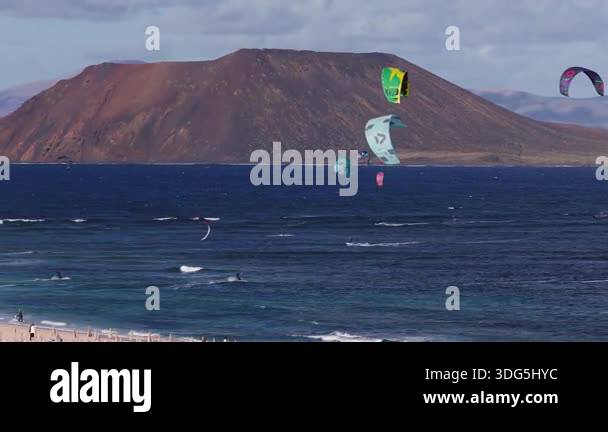 Aerial view of Fuerteventura north coast, Isla de Lobos cone, sandy ...