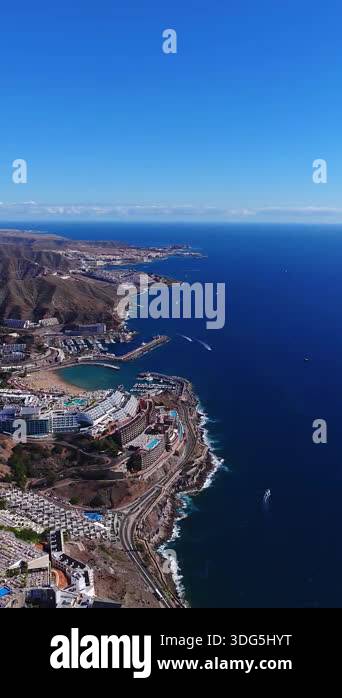 Aerial view of southern Gran Canaria with volcanic cliffs, terraced ...