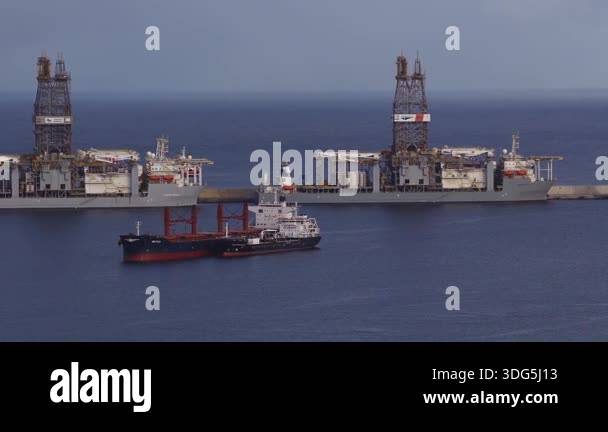 Aerial 4K view shows Atwood Admiral and offshore rigs at Port of Las ...