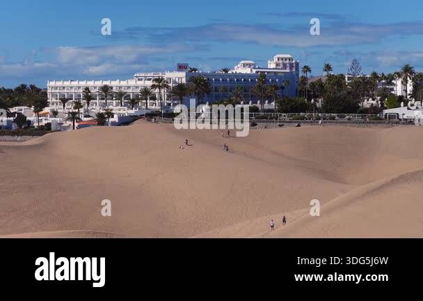 Aerial view of Maspalomas sand dunes in Gran Canaria, with the white ...