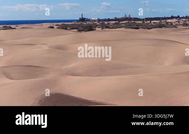 Aerial view of Maspalomas dunes, lighthouse and resort buildings on ...