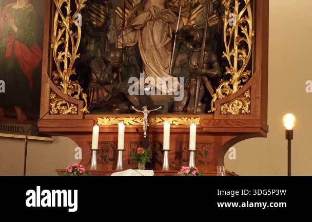 An altar inside an old church featuring an image of Jesus. The sacred ...